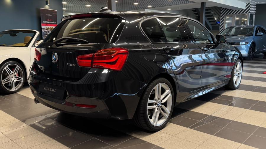 Black BMW 118 2017 in Riga, with an engine capacity of 2.00 L and mileage of 229 thousand km for 12990 €, photo 1 on AUTOMOTO.COM.LV