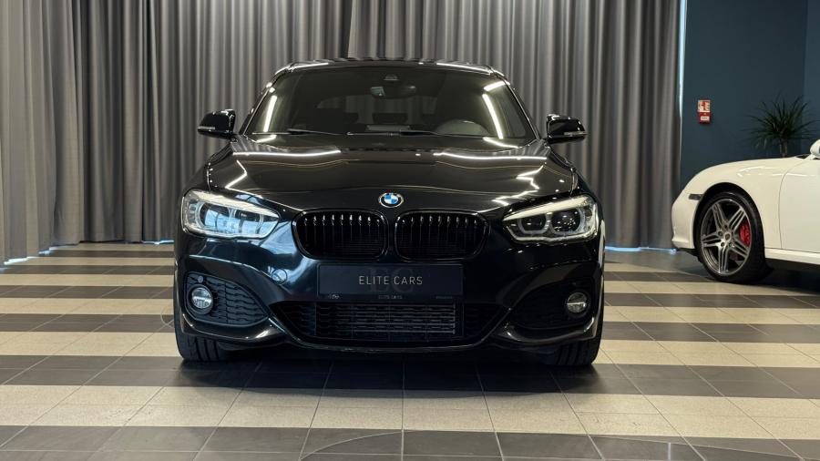 Black BMW 118 2017 in Riga, with an engine capacity of 2.00 L and mileage of 229 thousand km for 12990 €, photo 3 on AUTOMOTO.COM.LV