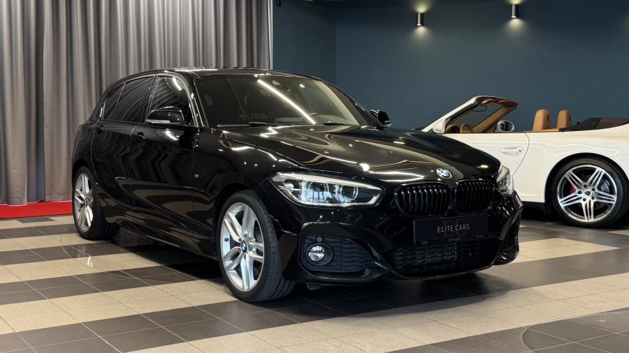 Black BMW 118 2017 in Riga, with an engine capacity of 2.00 L and mileage of 229 thousand km for 12990 €, photo 5 on AUTOMOTO.COM.LV