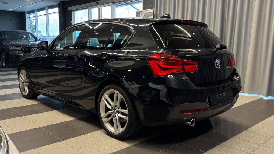 Black BMW 118 2017 in Riga, with an engine capacity of 2.00 L and mileage of 229 thousand km for 12990 €, photo 6 on AUTOMOTO.COM.LV