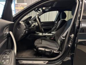 Black BMW 118 2017 in Riga, with an engine capacity of 2.00 L and mileage of 229 thousand km for 12990 €, photo 8 on AUTOMOTO.COM.LV