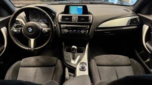 Black BMW 118 2017 in Riga, with an engine capacity of 2.00 L and mileage of 229 thousand km for 12990 €, photo 10 on AUTOMOTO.COM.LV