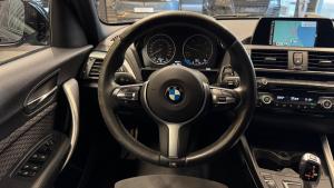 Black BMW 118 2017 in Riga, with an engine capacity of 2.00 L and mileage of 229 thousand km for 12990 €, photo 11 on AUTOMOTO.COM.LV