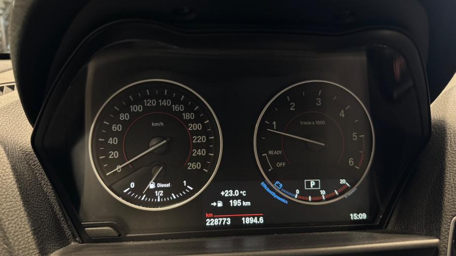 Black BMW 118 2017 in Riga, with an engine capacity of 2.00 L and mileage of 229 thousand km for 12990 €, photo 12 on AUTOMOTO.COM.LV