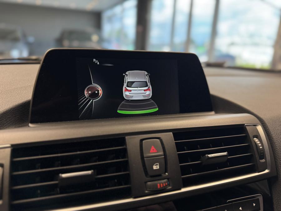 Black BMW 118 2017 in Riga, with an engine capacity of 2.00 L and mileage of 229 thousand km for 12990 €, photo 13 on AUTOMOTO.COM.LV
