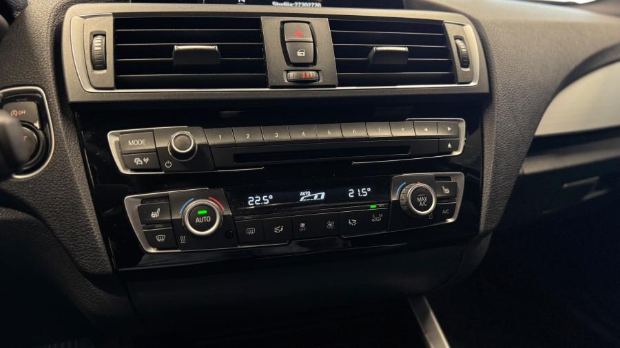 Black BMW 118 2017 in Riga, with an engine capacity of 2.00 L and mileage of 229 thousand km for 12990 €, photo 14 on AUTOMOTO.COM.LV