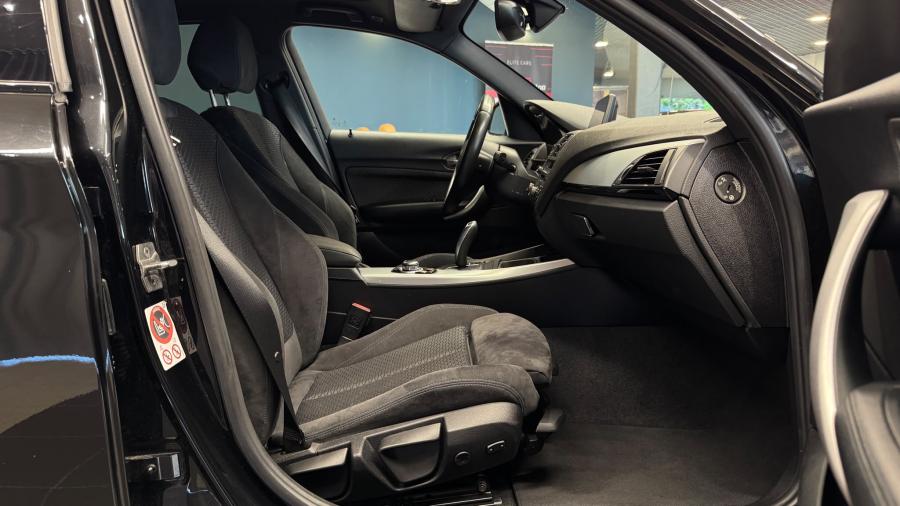 Black BMW 118 2017 in Riga, with an engine capacity of 2.00 L and mileage of 229 thousand km for 12990 €, photo 16 on AUTOMOTO.COM.LV
