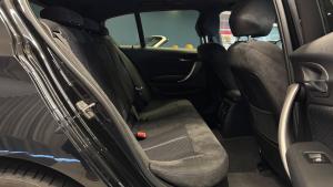 Black BMW 118 2017 in Riga, with an engine capacity of 2.00 L and mileage of 229 thousand km for 12990 €, photo 19 on AUTOMOTO.COM.LV