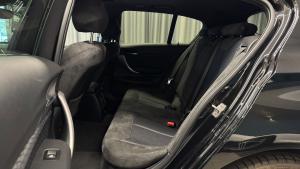 Black BMW 118 2017 in Riga, with an engine capacity of 2.00 L and mileage of 229 thousand km for 12990 €, photo 20 on AUTOMOTO.COM.LV