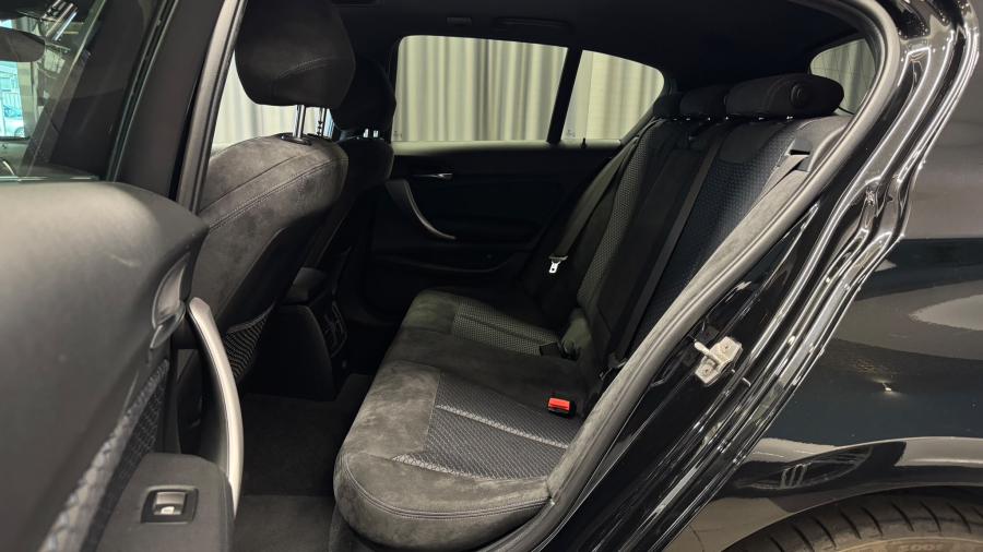 Black BMW 118 2017 in Riga, with an engine capacity of 2.00 L and mileage of 229 thousand km for 12990 €, photo 20 on AUTOMOTO.COM.LV
