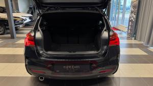 Black BMW 118 2017 in Riga, with an engine capacity of 2.00 L and mileage of 229 thousand km for 12990 €, photo 21 on AUTOMOTO.COM.LV