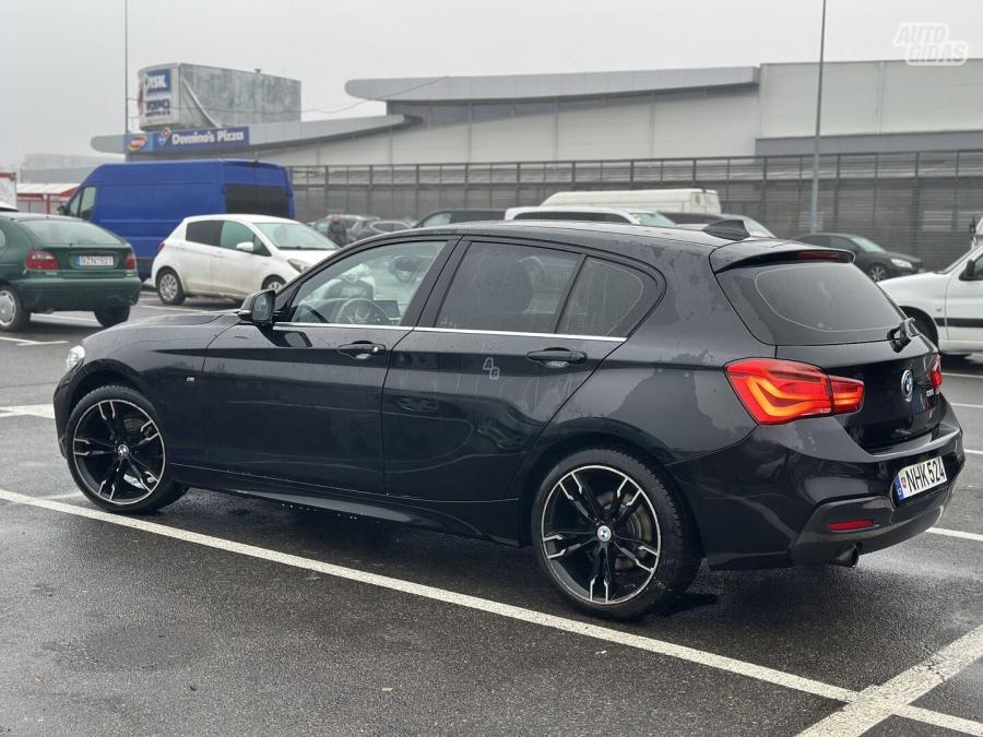 Black BMW 118 2018 in Vilnius, with an engine capacity of 1.50 L and mileage of 100 thousand km for 16500 €, photo 4 on AUTOMOTO.COM.LV
