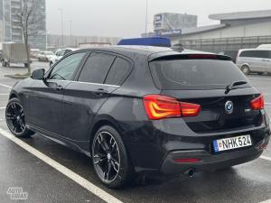 Black BMW 118 2018 in Vilnius, with an engine capacity of 1.50 L and mileage of 100 thousand km for 16500 €, photo 5 on AUTOMOTO.COM.LV
