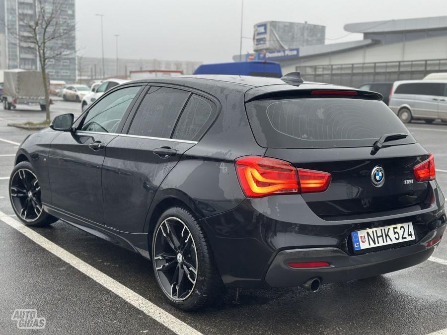 Black BMW 118 2018 in Vilnius, with an engine capacity of 1.50 L and mileage of 100 thousand km for 16500 €, photo 5 on AUTOMOTO.COM.LV