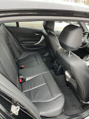 Black BMW 118 2018 in Vilnius, with an engine capacity of 1.50 L and mileage of 100 thousand km for 16500 €, photo 17 on AUTOMOTO.COM.LV