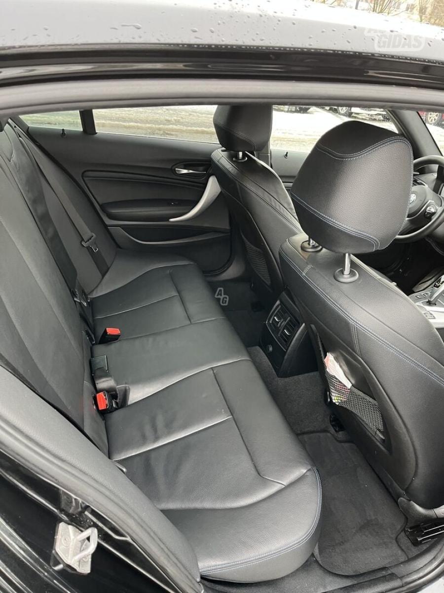 Black BMW 118 2018 in Vilnius, with an engine capacity of 1.50 L and mileage of 100 thousand km for 16500 €, photo 17 on AUTOMOTO.COM.LV