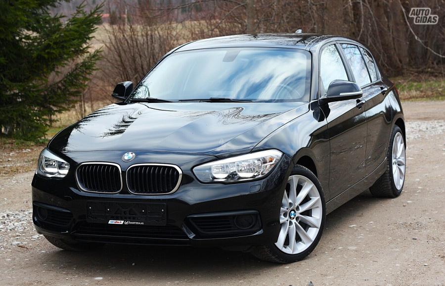 Black BMW 118 2018 in Petrikaiciai, with an engine capacity of 2.00 L and mileage of 90 thousand km for 11499 €, photo 1 on AUTOMOTO.COM.LV