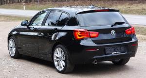 Black BMW 118 2018 in Petrikaiciai, with an engine capacity of 2.00 L and mileage of 90 thousand km for 11499 €, photo 11 on AUTOMOTO.COM.LV