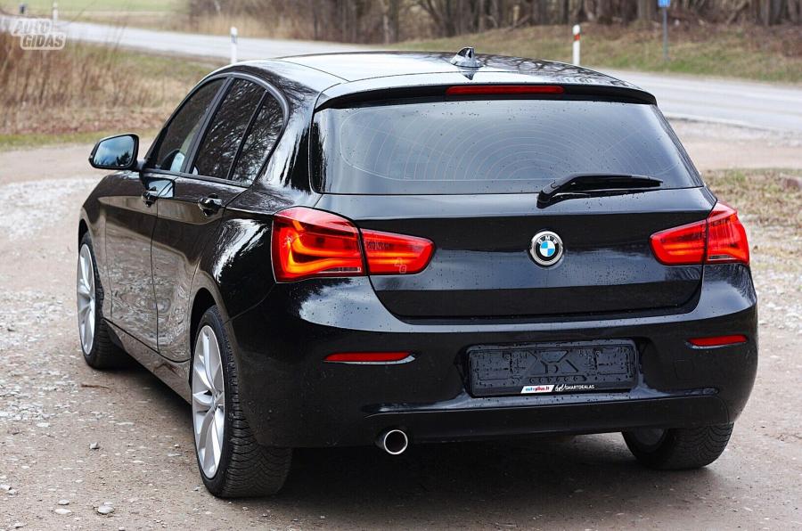 Black BMW 118 2018 in Petrikaiciai, with an engine capacity of 2.00 L and mileage of 90 thousand km for 11499 €, photo 12 on AUTOMOTO.COM.LV