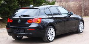 Black BMW 118 2018 in Petrikaiciai, with an engine capacity of 2.00 L and mileage of 90 thousand km for 11499 €, photo 16 on AUTOMOTO.COM.LV