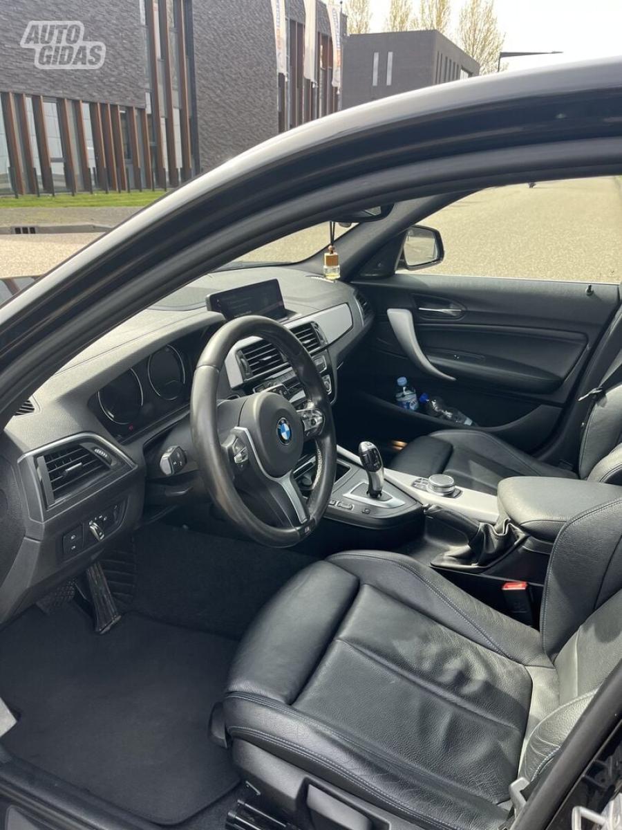 Melns BMW 118 2018 Viļņa, ar dzinēja tilpumu 1.50 L un nobraukumu 107 tūkst. km par 15950 €, foto 8 vietnē AUTOMOTO.COM.LV