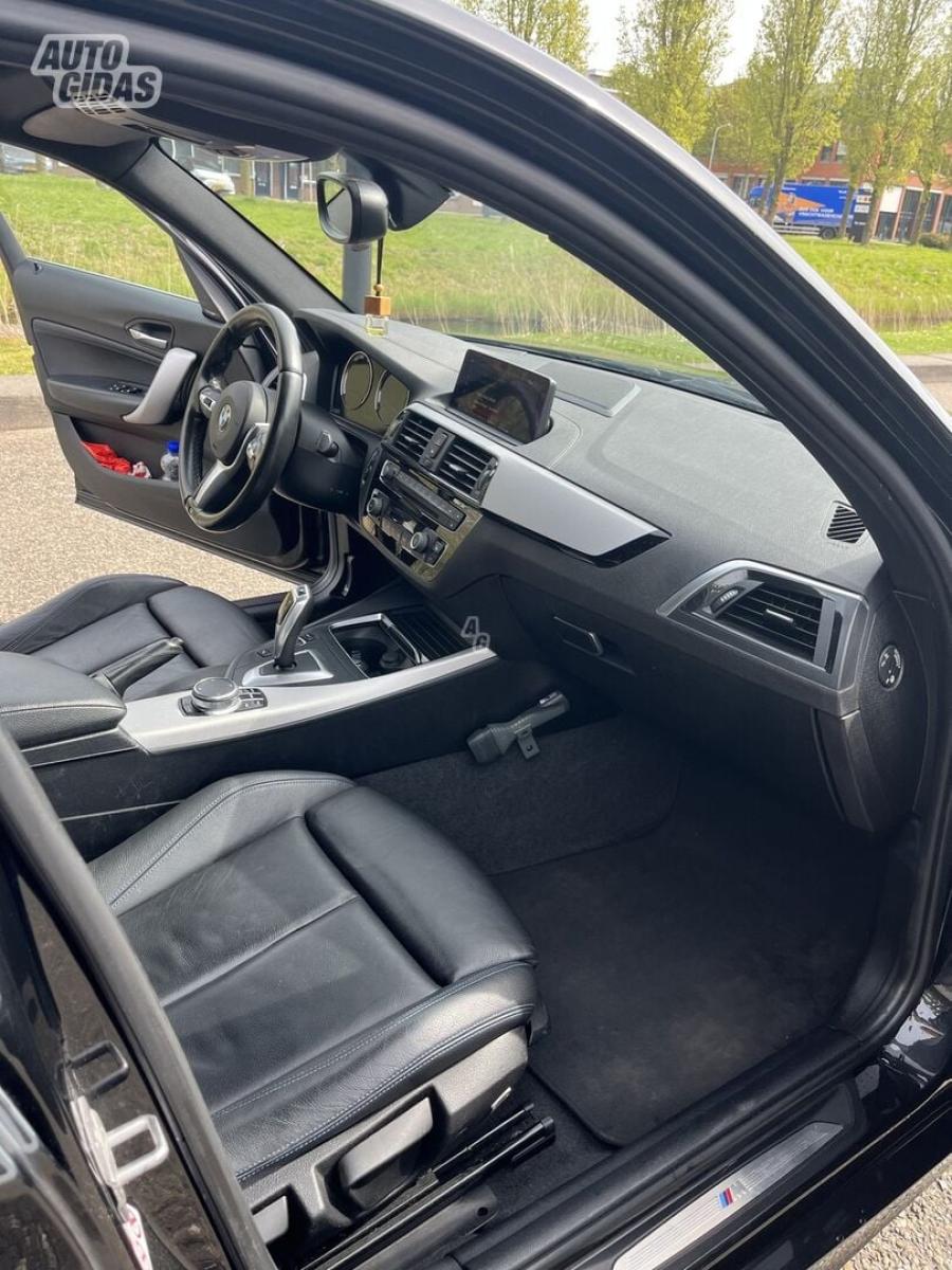 Melns BMW 118 2018 Viļņa, ar dzinēja tilpumu 1.50 L un nobraukumu 107 tūkst. km par 15950 €, foto 9 vietnē AUTOMOTO.COM.LV