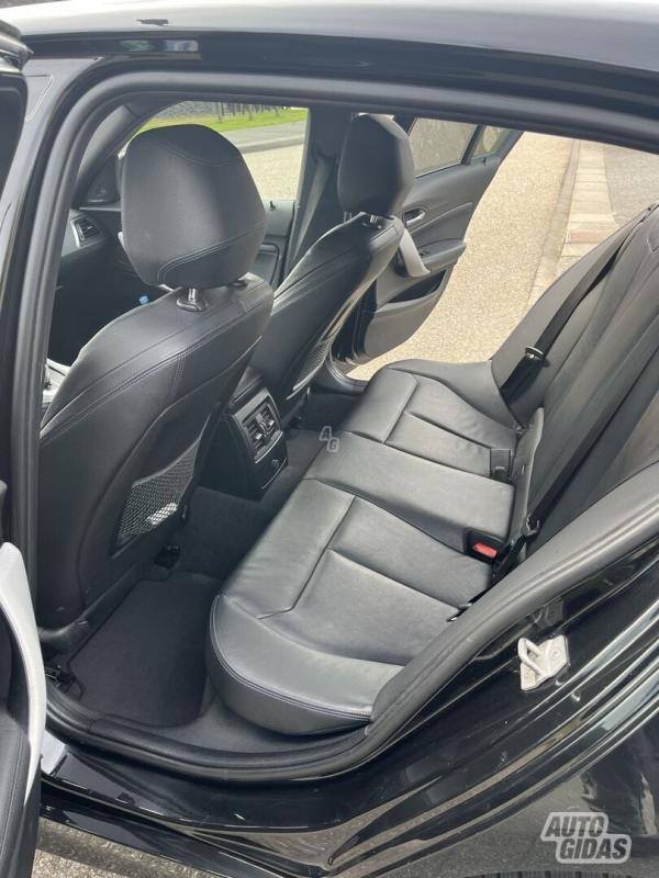 Melns BMW 118 2018 Viļņa, ar dzinēja tilpumu 1.50 L un nobraukumu 107 tūkst. km par 15950 €, foto 9 vietnē AUTOMOTO.COM.LV
