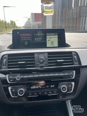 Melns BMW 118 2018 Viļņa, ar dzinēja tilpumu 1.50 L un nobraukumu 107 tūkst. km par 15950 €, foto 14 vietnē AUTOMOTO.COM.LV