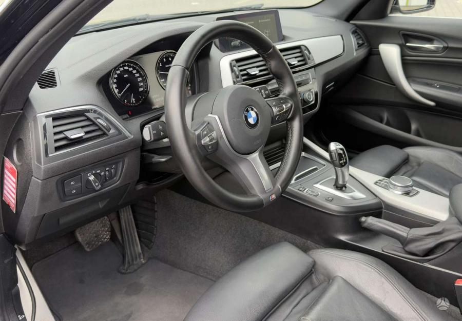 Melns BMW 118 2018 Viļņa, ar dzinēja tilpumu 1.50 L un nobraukumu 280 tūkst. km par 10650 €, foto 21 vietnē AUTOMOTO.COM.LV