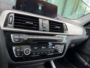 Black BMW 118 2018 in Kaunas, with an engine capacity of 1.50 L and mileage of 125 thousand km for 10990 €, photo 21 on AUTOMOTO.COM.LV