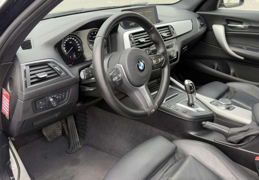 Melns BMW 118 2018 Viļņa, ar dzinēja tilpumu 1.50 L un nobraukumu 280 tūkst. km par 10200 €, foto 21 vietnē AUTOMOTO.COM.LV