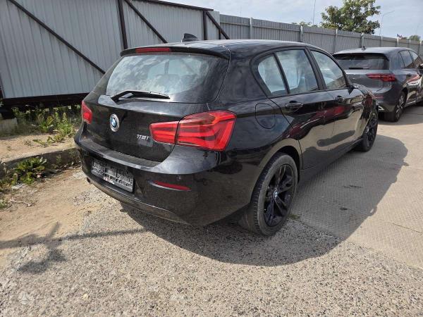 Black BMW 118 2018 in Siauliai, with an engine capacity of 1.50 L and mileage of 107 thousand km for 4600 €, photo 4 on AUTOMOTO.COM.LV
