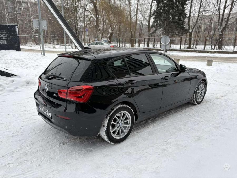 Black BMW 118 2019 in Vilnius, with an engine capacity of 1.50 L and mileage of 119 thousand km for 10900 €, photo 6 on AUTOMOTO.COM.LV