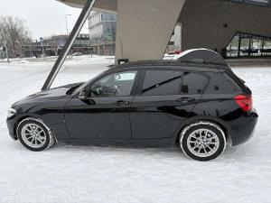 Black BMW 118 2019 in Vilnius, with an engine capacity of 1.50 L and mileage of 119 thousand km for 10900 €, photo 9 on AUTOMOTO.COM.LV