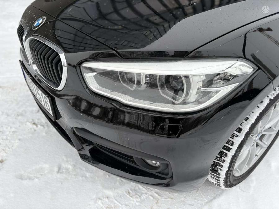 Black BMW 118 2019 in Vilnius, with an engine capacity of 1.50 L and mileage of 119 thousand km for 10900 €, photo 12 on AUTOMOTO.COM.LV