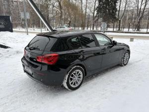 Black BMW 118 2019 in Vilnius, with an engine capacity of 1.50 L and mileage of 119 thousand km for 10850 €, photo 12 on AUTOMOTO.COM.LV