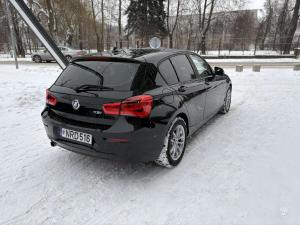 Black BMW 118 2019 in Vilnius, with an engine capacity of 1.50 L and mileage of 119 thousand km for 10850 €, photo 13 on AUTOMOTO.COM.LV