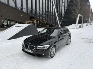 Black BMW 118 2019 in Vilnius, with an engine capacity of 1.50 L and mileage of 119 thousand km for 10850 €, photo 17 on AUTOMOTO.COM.LV