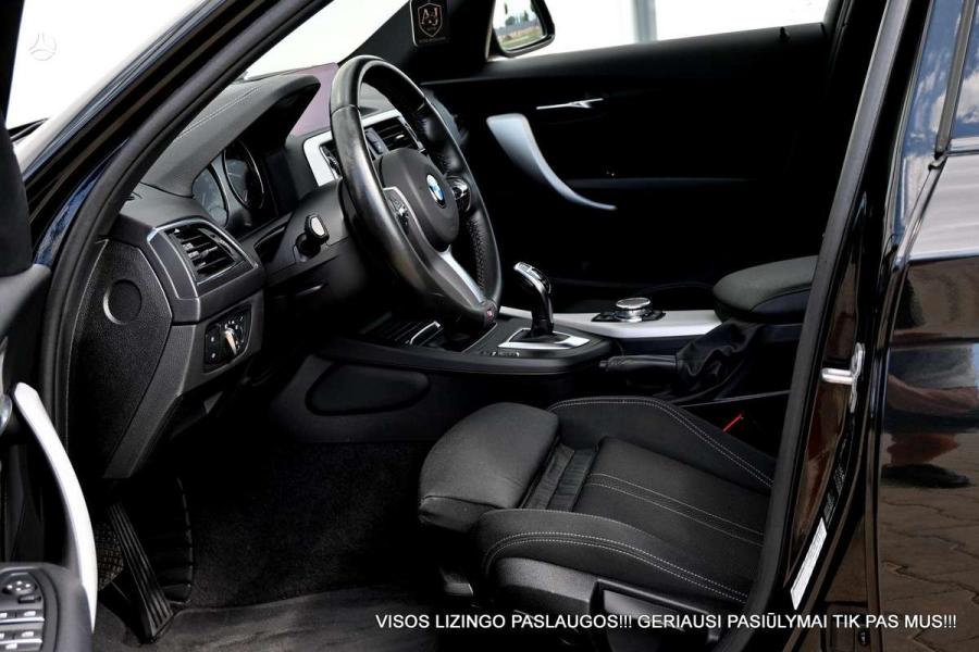 Black BMW 118 2019 in Kretinga, with an engine capacity of 2.00 L and mileage of 185 thousand km for 11999 €, photo 16 on AUTOMOTO.COM.LV