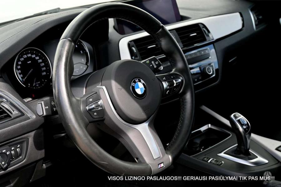 Black BMW 118 2019 in Kretinga, with an engine capacity of 2.00 L and mileage of 185 thousand km for 11999 €, photo 18 on AUTOMOTO.COM.LV