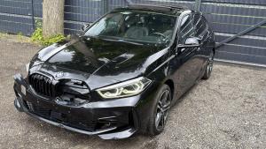 Black BMW 118 2020 in Jonava, with an engine capacity of 2.00 L and mileage of 90 thousand km for 13700 €, photo 14 on AUTOMOTO.COM.LV