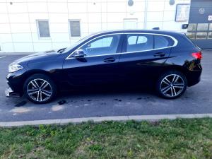 Black BMW 118 2024 in Vilnius, with an engine capacity of 1.50 L and mileage of 32 thousand km for 15600 €, photo 4 on AUTOMOTO.COM.LV