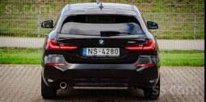 Black BMW 118 2021 in Riga, with an engine capacity of 1.50 L and mileage of 119 thousand km for 16500 €, photo 7 on AUTOMOTO.COM.LV