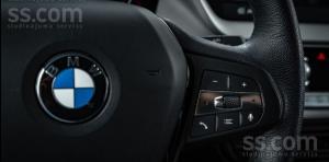 Black BMW 118 2021 in Riga, with an engine capacity of 1.50 L and mileage of 119 thousand km for 16500 €, photo 21 on AUTOMOTO.COM.LV