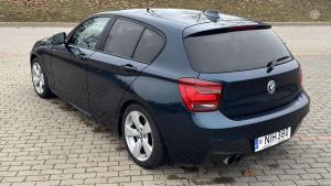 Blue BMW 118 2011 in Jonava, with an engine capacity of 2.00 L and mileage of 266 thousand km for 7700 €, photo 7 on AUTOMOTO.COM.LV