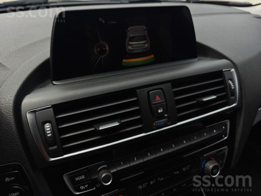 Blue BMW 118 2015 in Riga, with an engine capacity of 1.60 L and mileage of 209 thousand km for 9700 €, photo 16 on AUTOMOTO.COM.LV