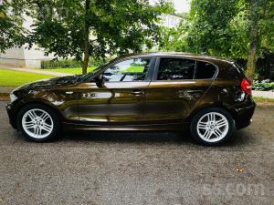 Brown BMW 118 2011 in Riga, with an engine capacity of 2.00 L and mileage of 317 thousand km for 5199 €, photo 4 on AUTOMOTO.COM.LV