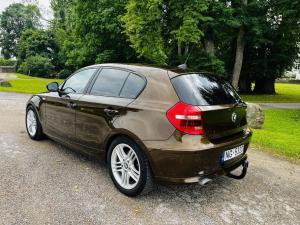Brown BMW 118 2011 in Riga, with an engine capacity of 2.00 L and mileage of 317 thousand km for 5199 €, photo 8 on AUTOMOTO.COM.LV