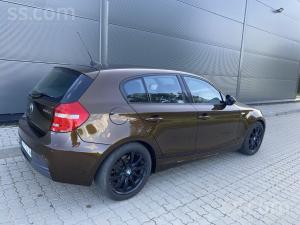 Brown BMW 118 2011 in Tukums, with an engine capacity of 2.00 L and mileage of 190 thousand km for 5190 €, photo 3 on AUTOMOTO.COM.LV