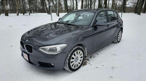 Grey BMW 118 2013 in Alytus, with an engine capacity of 2.00 L and mileage of 293 thousand km for 7250 €, photo 1 on AUTOMOTO.COM.LV